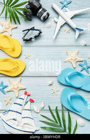 Summer accessories creating a frame on white background with copy space ...
