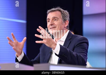 Grenoble mayor Eric Piolle poses for pictures ahead of an interview for ...