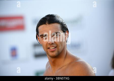 Thomas Ceccon of Italy competing in the 100m. Backstroke Men Final ...