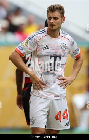Josip Stanisic of FC Bayern Munchen celebrates after scoring first goal ...