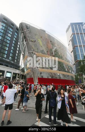 Tourists visit the world's only giant wheel-shaped building of French ...