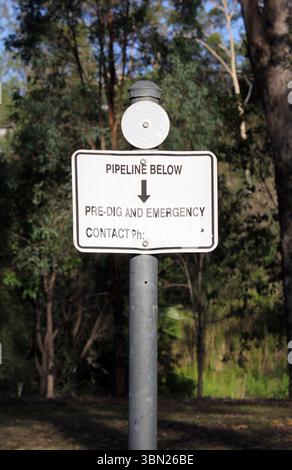 Caution Hazard sign on a metal wire rails at Oceanside, California ...