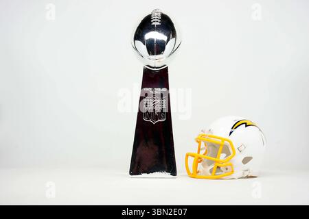 A Los Angeles Chargers helmet and Super Bowl Vince Lombardi Trophy ...