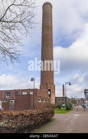 Modern newly build houses surrounding the old towers of the ENKA ...