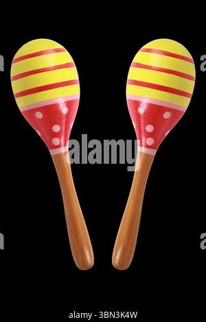 Beautiful maracas on black background Stock Photo - Alamy