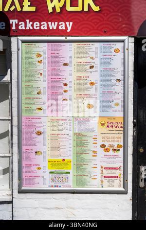 Extensive Chinese takeaway restaurant menu on an outside wall Stock ...