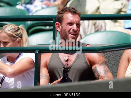 Aryna Sabalenka with her partner Georgios Frangulis (right) following a ...