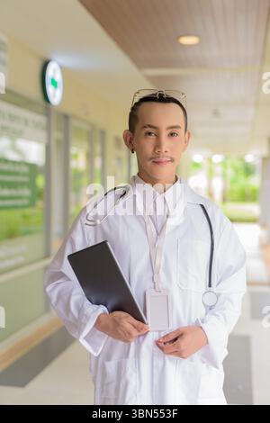 Non binary person using computer laptop making fish face with lips ...