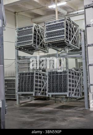 Professional equipment for turning over bottles of sparkling wine ...