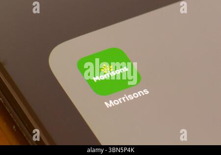 Morrisons supermarket app on smartphone screen with a VISA card to make ...