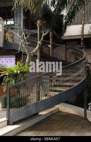 Bali, Indonesia - June 04, 2025: Different tropical plants, building ...