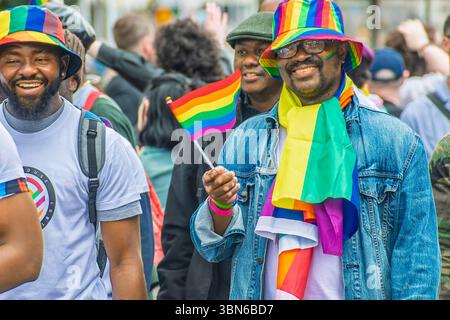 A Pride marchers in vibrant rainbow colors celebrating 10 years of ...