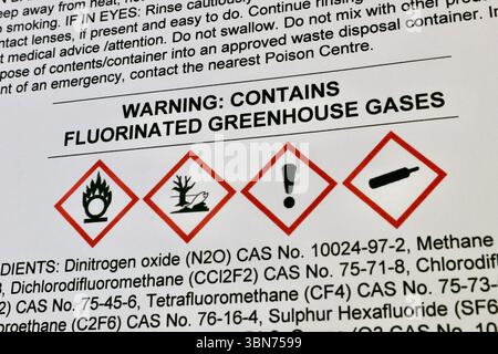 Warning label lists greenhouse gases like HCFC-142b, Hexafluoroethane ...