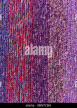 Woolen yarn of different colours knitted using garter stich as detailed ...