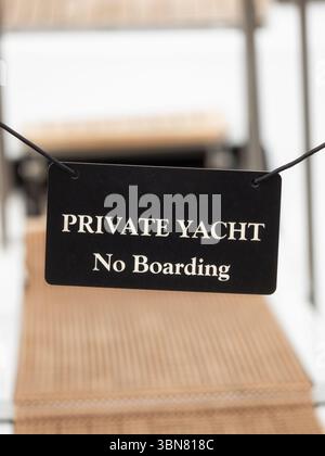 Sign across gangway for Private Yacht No Boarding Stock Photo - Alamy