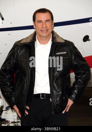 John Travolta at the Bombardier Hollywood private jet launch in Burbank ...