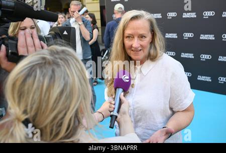 Munich, Germany. 01st July, 2025. The author Raynor Winn on the carpet ...