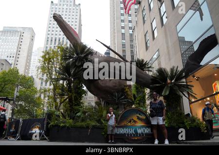 A display of a model dinosaur promoting the upcoming "Jurassic World ...