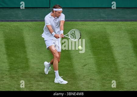 Arthur Rinderknech of France returns to Alexander Zverev of Germany ...