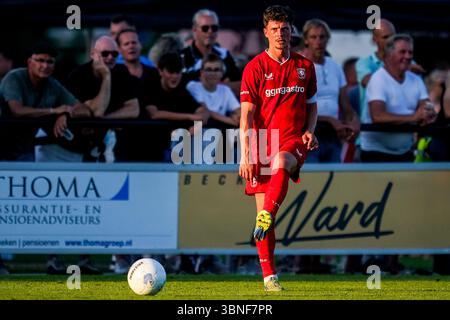 Bas Kuipers of FC Twente passes the ball during the first Training ...