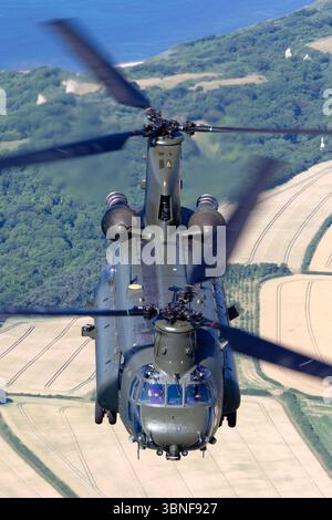 A Chinook helicopter in flight demonstrates its heavy-lift capability ...