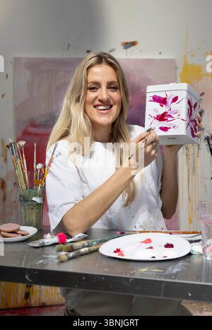 EDITORIAL USE ONLY Artist Sophie Tea reinvents biscuit tins to ...