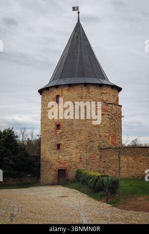Historic cylindrical tower with conical roof displays Renaissance ...