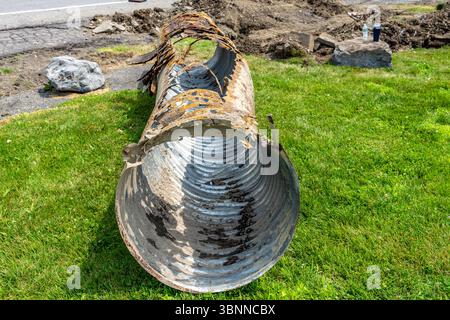Infrastructure photo of rusted out corrugated metal pipe, CMP, drainage ...