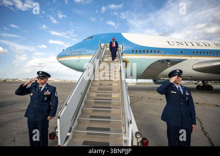 President Donald Trump disembarks Air Force One upon his arrival at ...