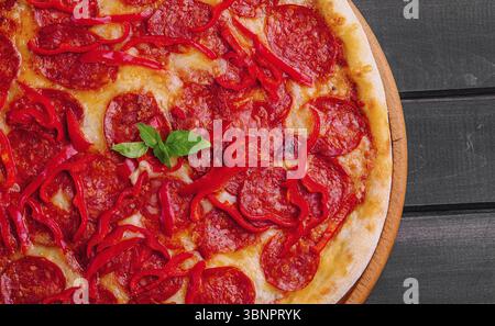 Tasty pepperoni pizza with red bell peper Stock Photo - Alamy