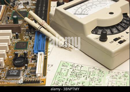 Old multimeter on the wiring diagram Stock Photo - Alamy