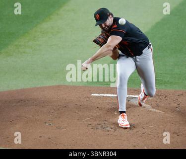 San Francisco Giants pitcher Robbie Ray throws against the Arizona ...