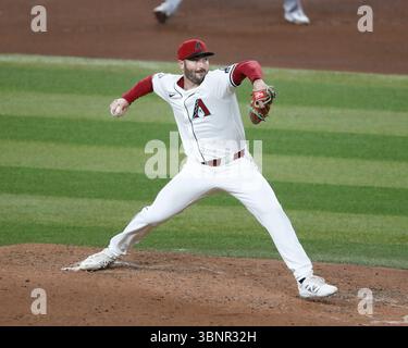 Arizona Diamondbacks pitcher John Curtiss stands during the seventh ...