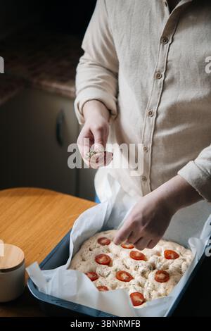 Italian food: man baking bread in traditional oven very common in small ...