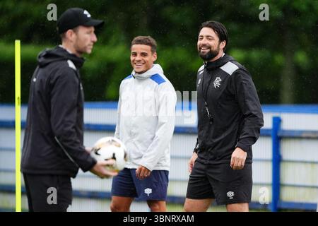 Rangers' Max Aarons (centre right) and Motherwell's Tawanda Maswanhise ...