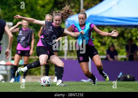 England's Grace Clinton (centre) and England's Niamh Charles celebrate ...
