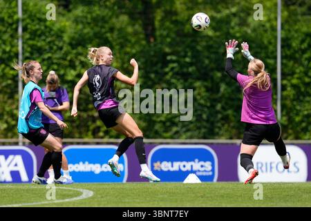 England goalkeeper Hannah Hampton (right) leaving the team hotel at The ...