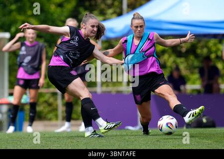 England's Grace Clinton (left) and Niamh Charles celebrate winning the ...