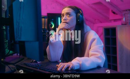 Frustrated sad woman gamer girl female streamer in headphones worry ...