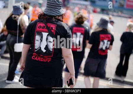 Oasis fans outside the stadium ahead of the first night of the Oasis ...
