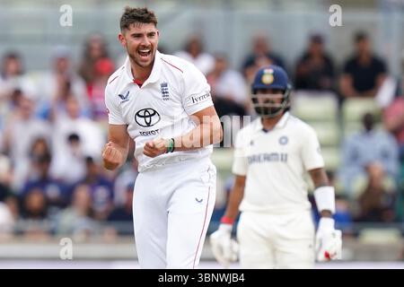 Josh Tongue of England celebrates the wicket of Karun Nair of India ...