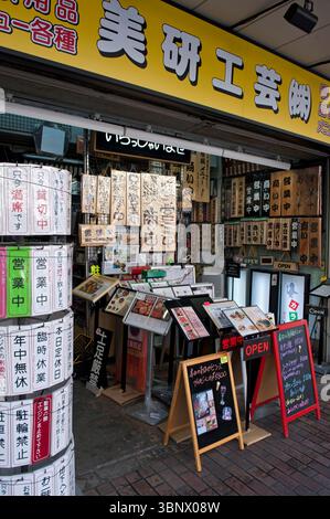 Shop selling all sorts of commercial business illuminated and wooden ...