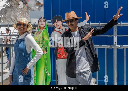 Bollywood actors Shah Rukh Khan, left, and Madhuri Dixit arrive for the ...