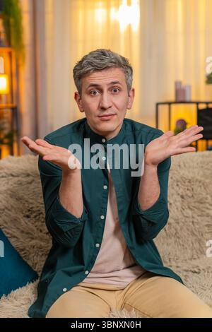 Man trying to explain something to a young woman who is listening Stock ...