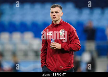 Ben White of the British & Irish Lions runs to score a try during the ...