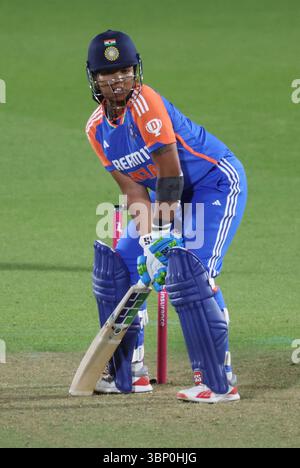 Harmanpreet Kaur (R), India women's cricket captain poses for a photo ...
