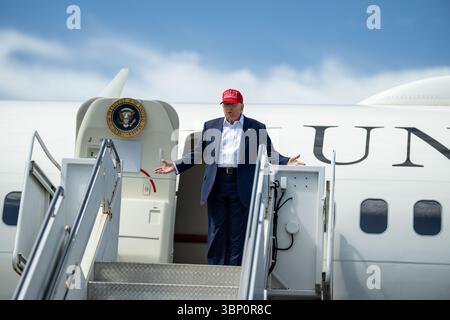 President Donald Trump disembarks Air Force One, Tuesday, June 23, 2026 ...