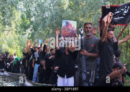 Kashmiri Shiite Muslims shout slogans during a Muharram procession in ...