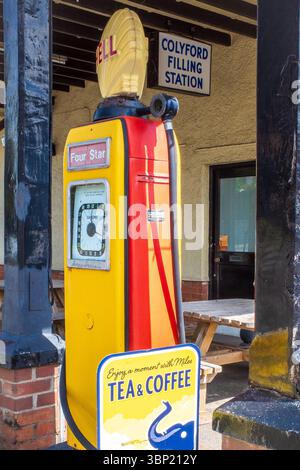 Restored old Shell filling station with original pumps built around ...