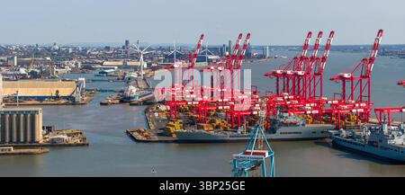 Aerial image of the Liverpool port facility with large cranes and ...